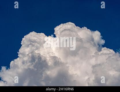 White fluffy big clouds against sky landscape Stock Photo - Alamy