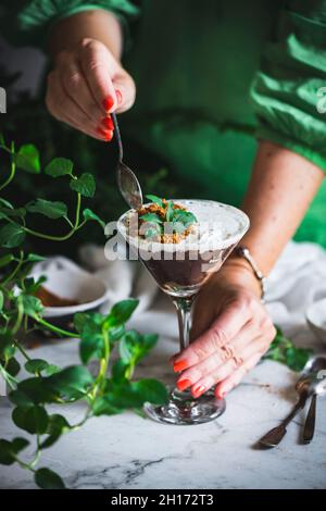 Serious online store employee working in office Stock Photo - Alamy