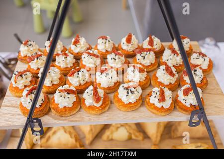 Different types of canapes on buffet table Stock Photo - Alamy