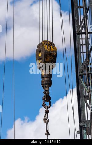 The traveling block on a portable truck-mounted oil well service ...