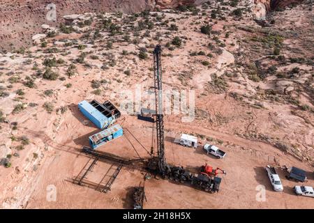 A pulling unit or workover rig on an oil well in Utah. Behind are the ...