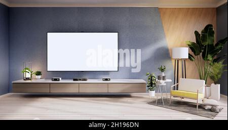 TV cabinet ,armchair on wood flooring and white and wooden wall design ...