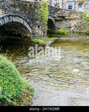 a two arch stone bridge constructed over a river in 1871 in the scenic ...
