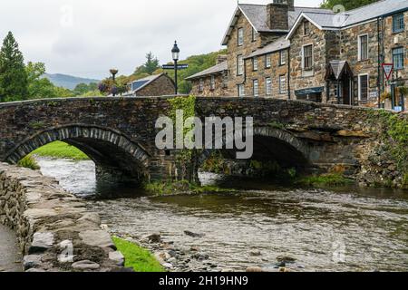 a two arch stone bridge constructed over a river in 1871 in the scenic ...