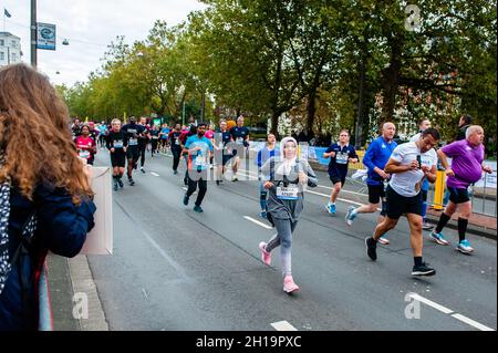 A Hijab-Wearing women Marathon Runner running at the marathon race in ...