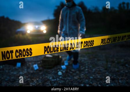 Police searching crime scene for evidence as part of murder inquiry in ...