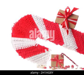 Candy cane pinata and gifts on white background Stock Photo - Alamy