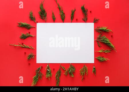 Composition with blank sheet of paper, coniferous branches, Christmas ...