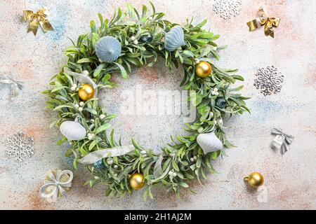 Beautiful mistletoe wreath on grunge background Stock Photo - Alamy