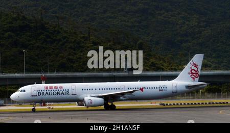 A Dragon Air airplane at the Hong Kong International airport Stock ...