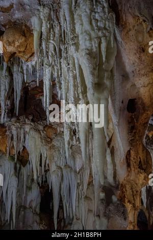 Subterranean landscape of stalactite formations hanging dramatically ...