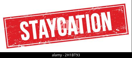STAYCATION text on red grungy rectangle stamp sign Stock Photo - Alamy