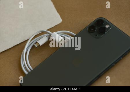 IPhone 11 with its charging cable Stock Photo - Alamy
