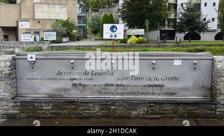 Lourdes France - 9 Oct 2021: Fountains dispensing blessed Holy water ...