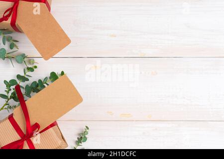 empty xmas wish list with little gift on wooden background Stock Photo ...