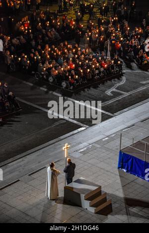 Lourdes, France - 9 Oct 2021: Pilgrims attend the Marian Torchlight ...