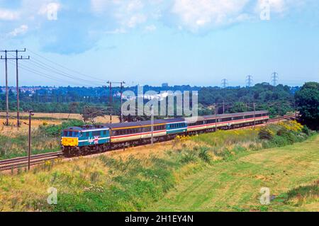 Class 86 electric locomotive number 86256 with a matching rake of ...