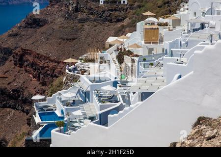 SANTORINI, GREECE - APRIL, 2018: Beautiful white houses and buildings ...