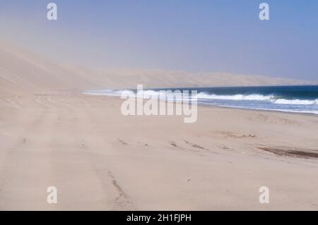 Sandstorm on the Skeleton Coast, dunes to the Atlantic Ocean, Namib ...