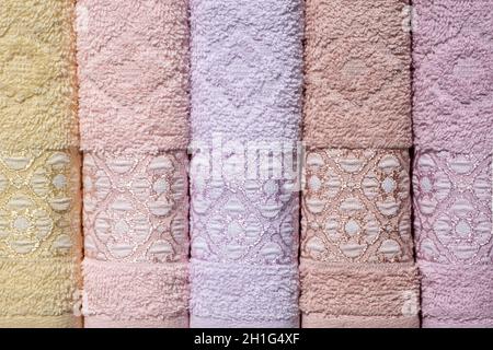 Stack of Rolled Towels with ornament for hotels and saunas in various ...