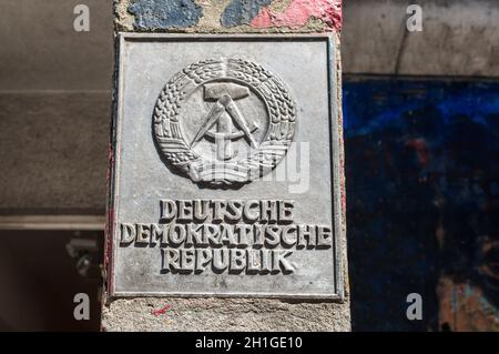 old emblem of the German Democratic Republic, the communist symbol of ...