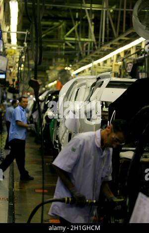 camacari, bahia / brazil - december 12, 2013: workers are seen on the ...