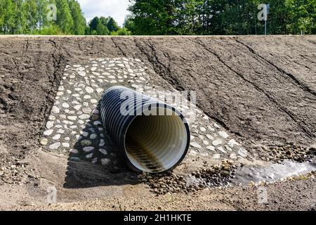 Drainage pipe: New culvert under small country side gravel road Stock ...