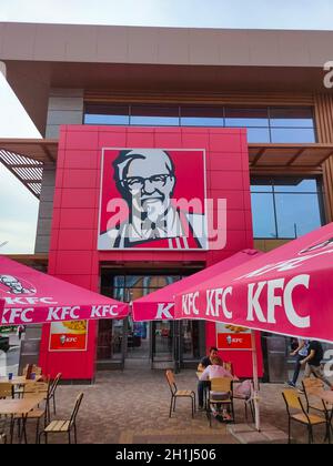 KFC Kentucky Fried Chicken illuminated sign logo Stock Photo - Alamy