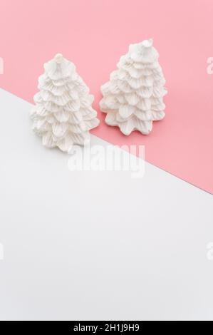 decorative white wax fir trees on a white and pink background Stock ...