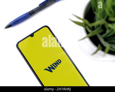 Lod, Israel - July 8, 2020: WIND app launch screen with logo on the display of a black mobile ...