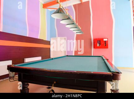 Billiard club. Gambling table with russian billiard set and dark cue ...
