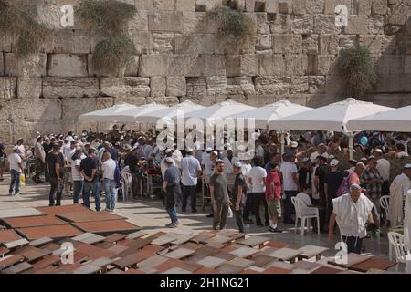 A lot of people gathered together to celebrate and pray in front of the ...