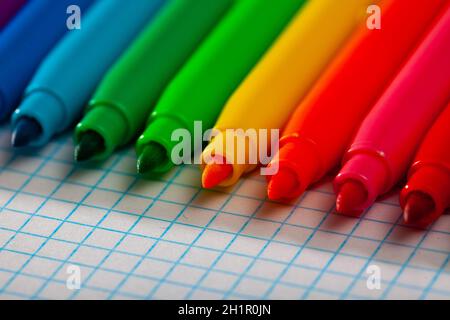 Image of opened multicolored markers on notepad Stock Photo - Alamy
