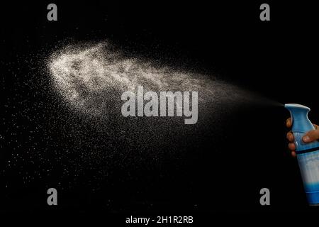 Spray, Pulverized fluid getting out from a container withstood by a ...