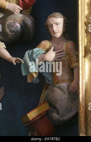 catholic statue of lady helper Stock Photo - Alamy