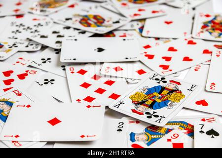 Playing cards are laid out on a table fan Stock Photo - Alamy
