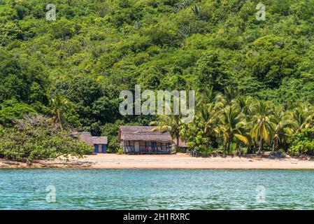 View of the Lokobe Strict Nature Reserve on Nosy Be Island from a boat ...