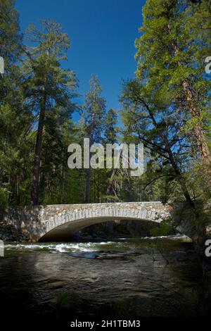 Pohono Bridge over the Merced River in autumn in Yosemite Valley ...