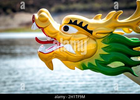 Head of a dragon on the bow of a dragon boa Stock Photo - Alamy