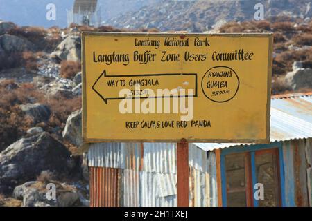 Funny directional sign in Kyangjing Gumba, Langtang National Park ...