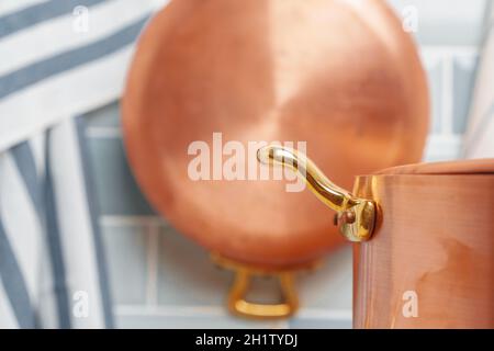 Modern kitchen details with copper kitchenware close up Stock Photo - Alamy