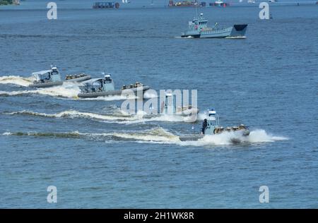 Miltary boats floating on the water, soldiers of Seaborne Special ...