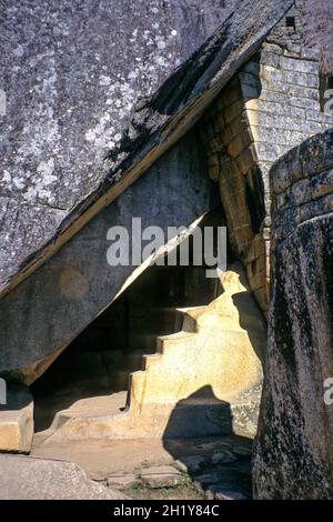[Machu Picchu], cave of the [Royal Tomb] and Inca stone steps beneath ...