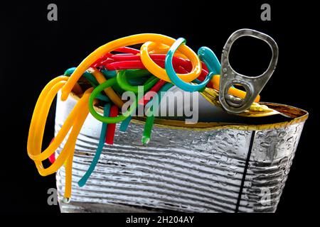 Different coloured spaghetti in a tin Stock Photo - Alamy