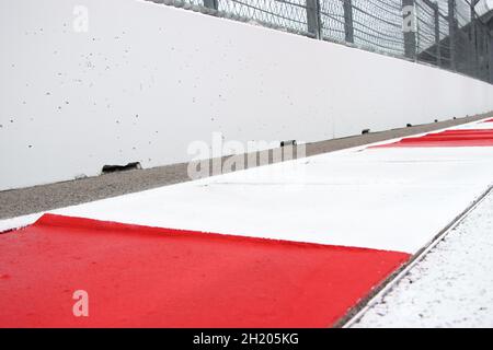 Texture of motor race asphalt and red white curb. Close up on Monaco ...