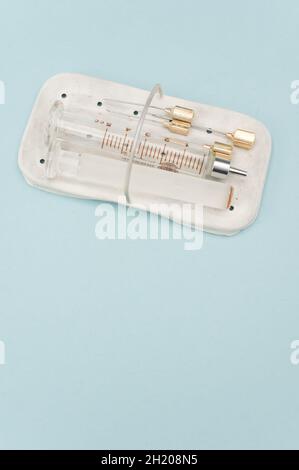 sterilized glass injection syringe in a box on a white surface Stock ...