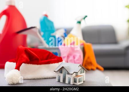 Cleaning before Christmas. Multicolored cleaning supplies. Sponges ...