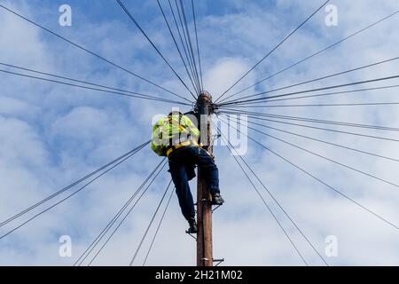 Kelly Group telecommunications, telecom engineer at work in London ...