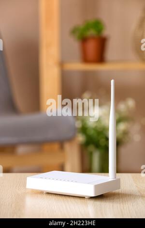 Modern Wi-Fi router indoors. Space for text Stock Photo - Alamy