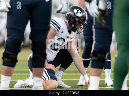 Brigham Young Cougars punter Ryan Rehkow (24) calls for the football ...